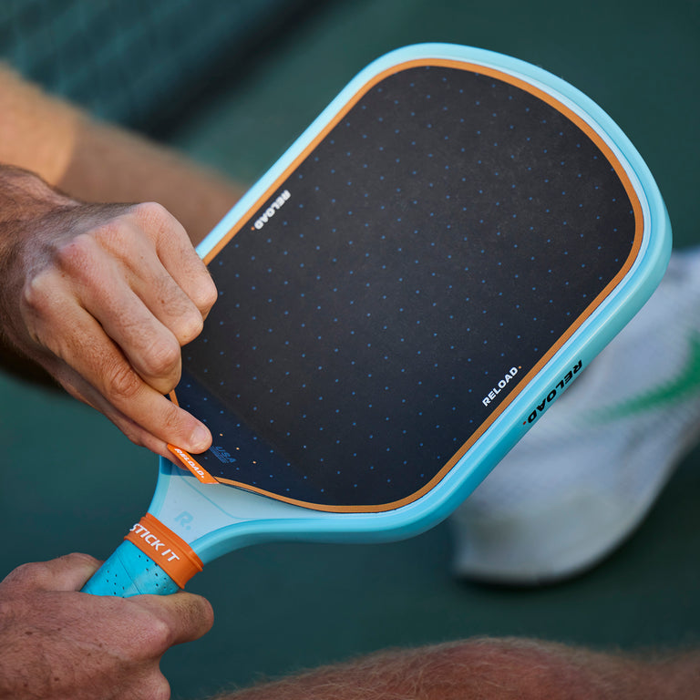 Reload - the pickleball paddle system with a replaceable surface